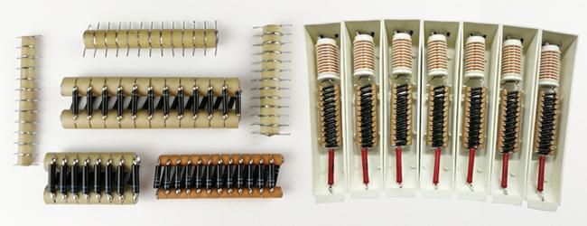Small overall design high voltage capacitor stacks and diode module